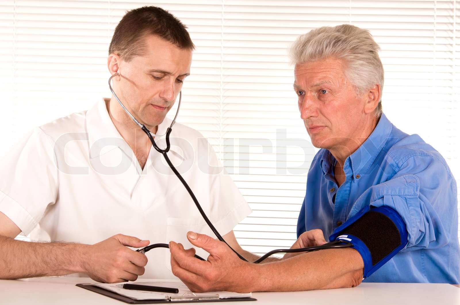 doctor and old patient | Stock image | Colourbox