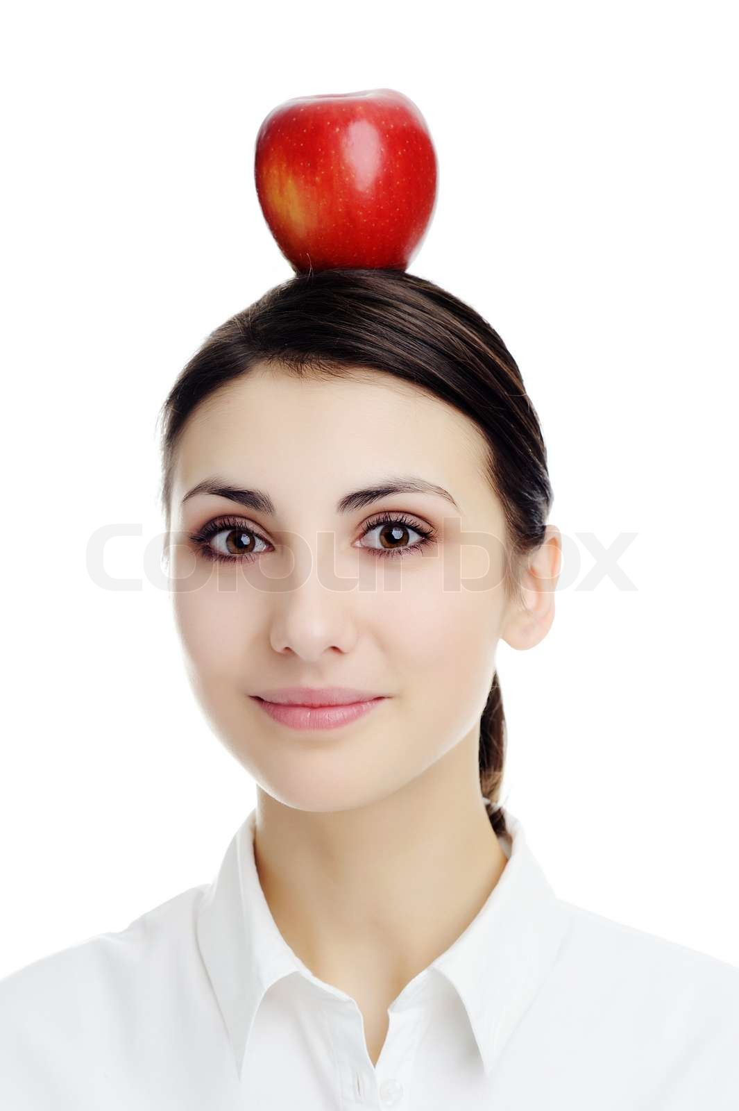 Red apple on head | Stock image | Colourbox