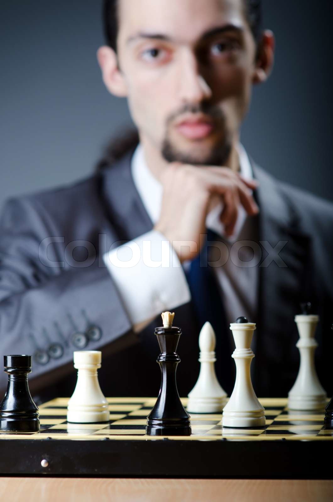Chess player playing his game | Stock image | Colourbox