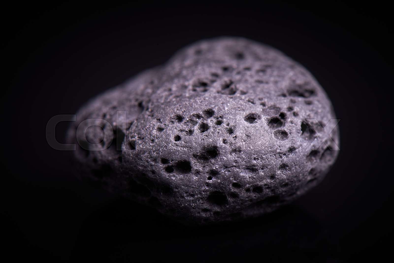 Black porous basalt stone | Stock image | Colourbox