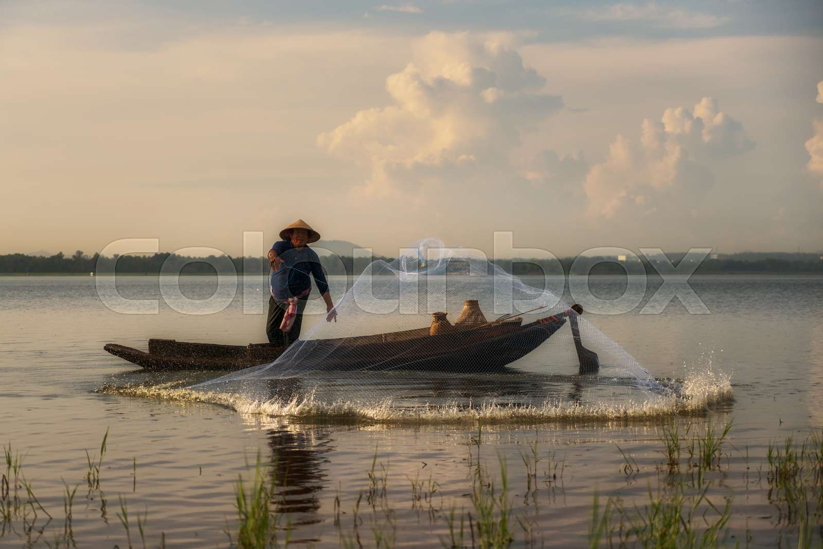 Fishermen are fishing with a net | Stock image | Colourbox