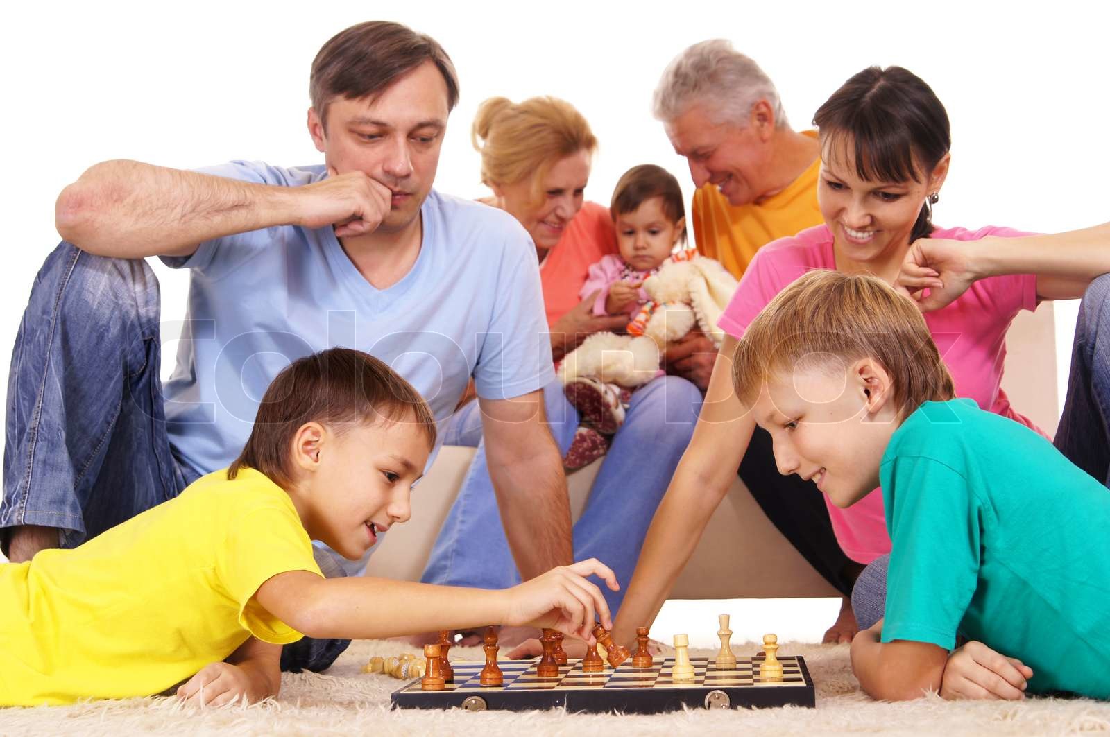 family playing chess | Stock image | Colourbox
