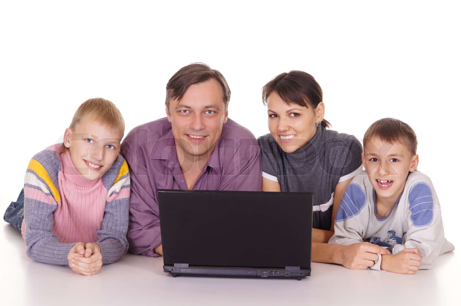 cute family with computer | Stock image | Colourbox