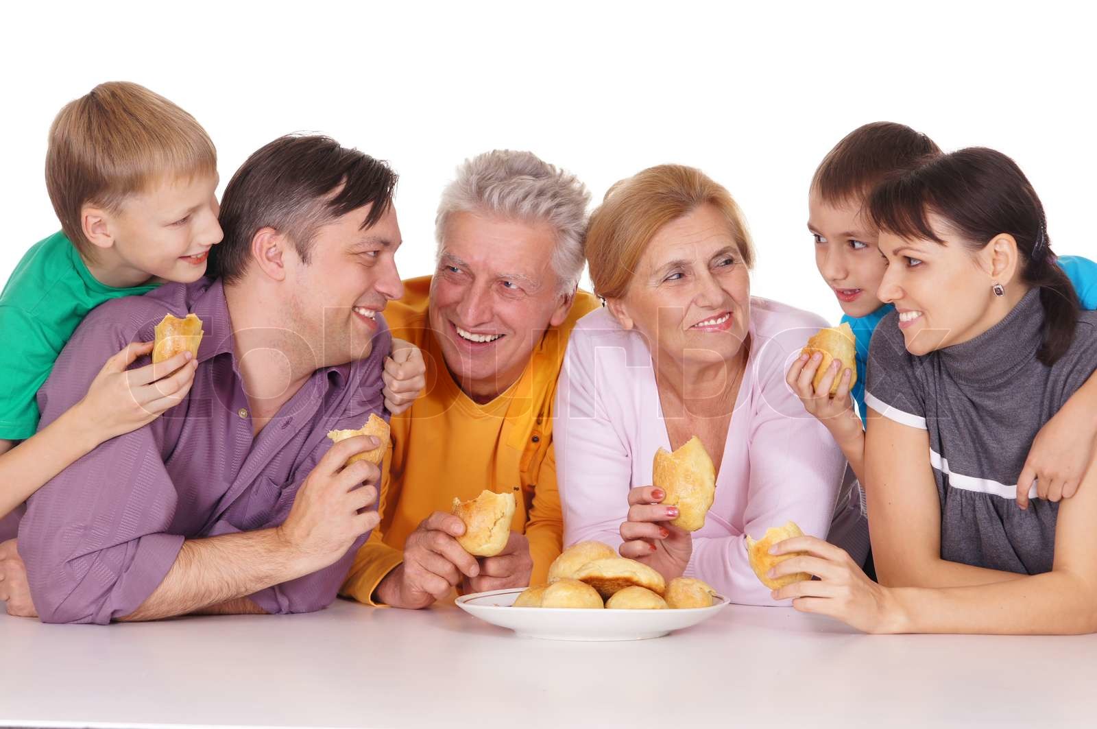 family eating cookies | Stock image | Colourbox
