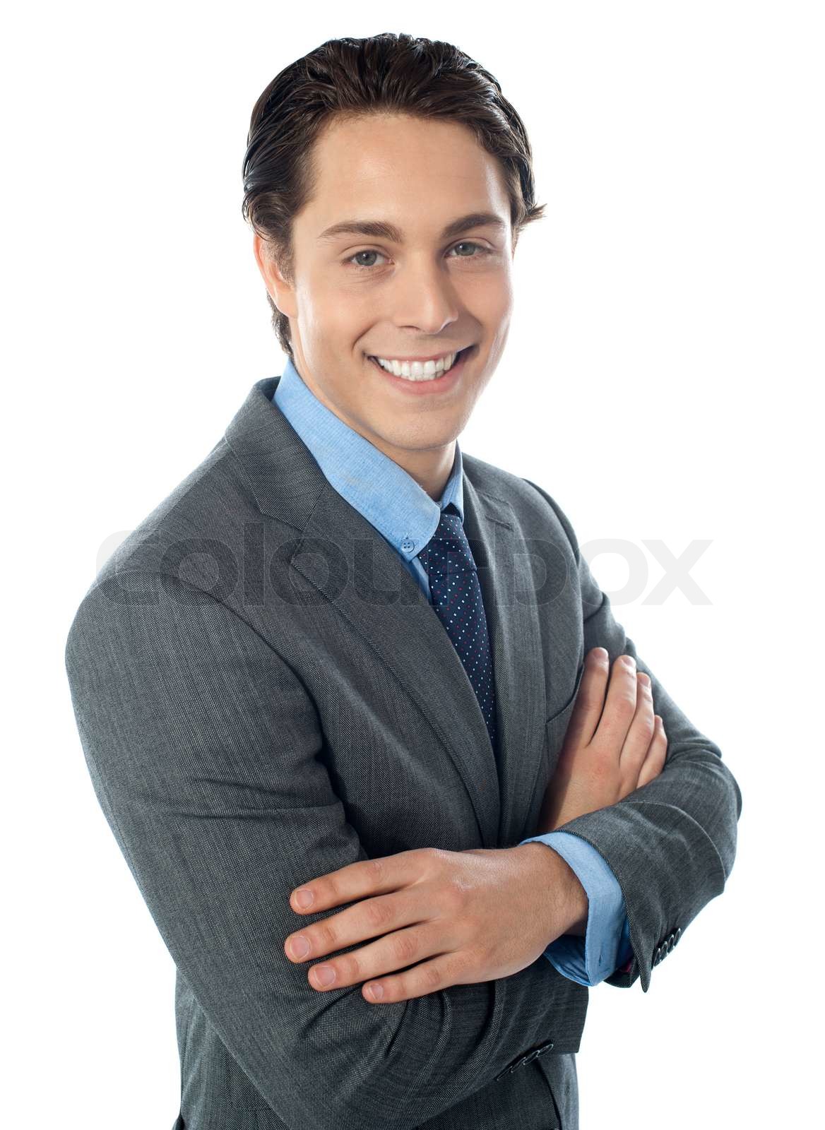 Charming young businessman posing in style | Stock image | Colourbox