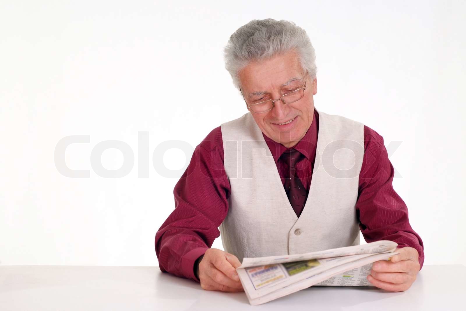 old guy with newspaper | Stock image | Colourbox