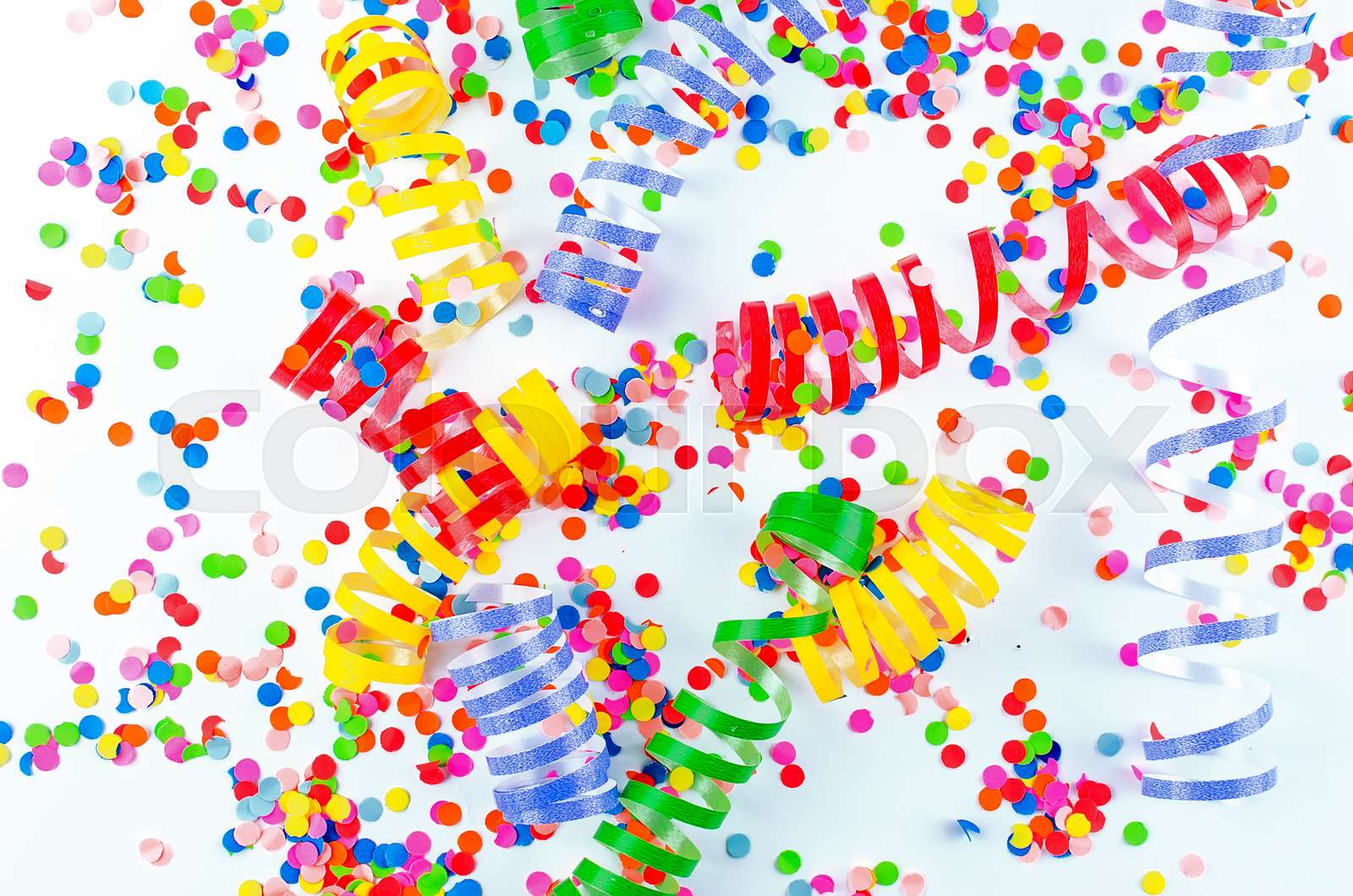 Colorful assorted confetti with serpentine on white | Stock image ...