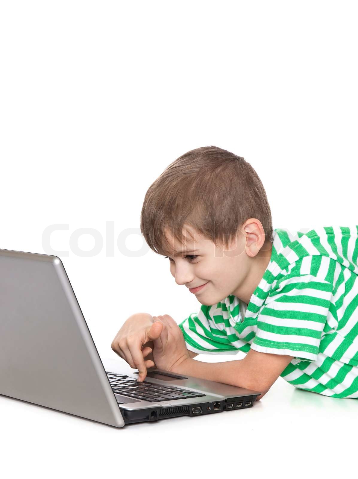 Boy holding a laptop | Stock image | Colourbox