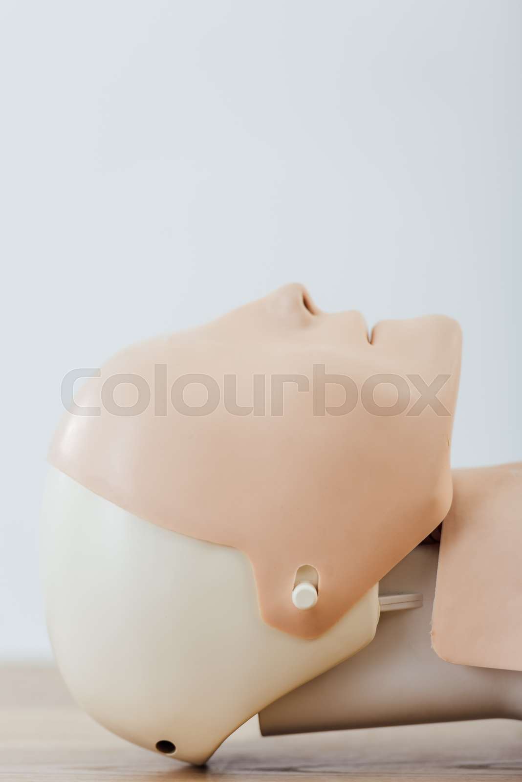 close up of cpr dummy for first aid training isolated on grey with copy ...