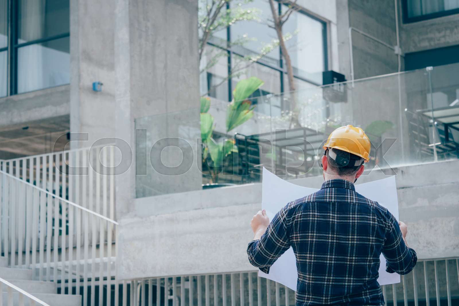 civil engineer working on building site with computer | Stock image ...