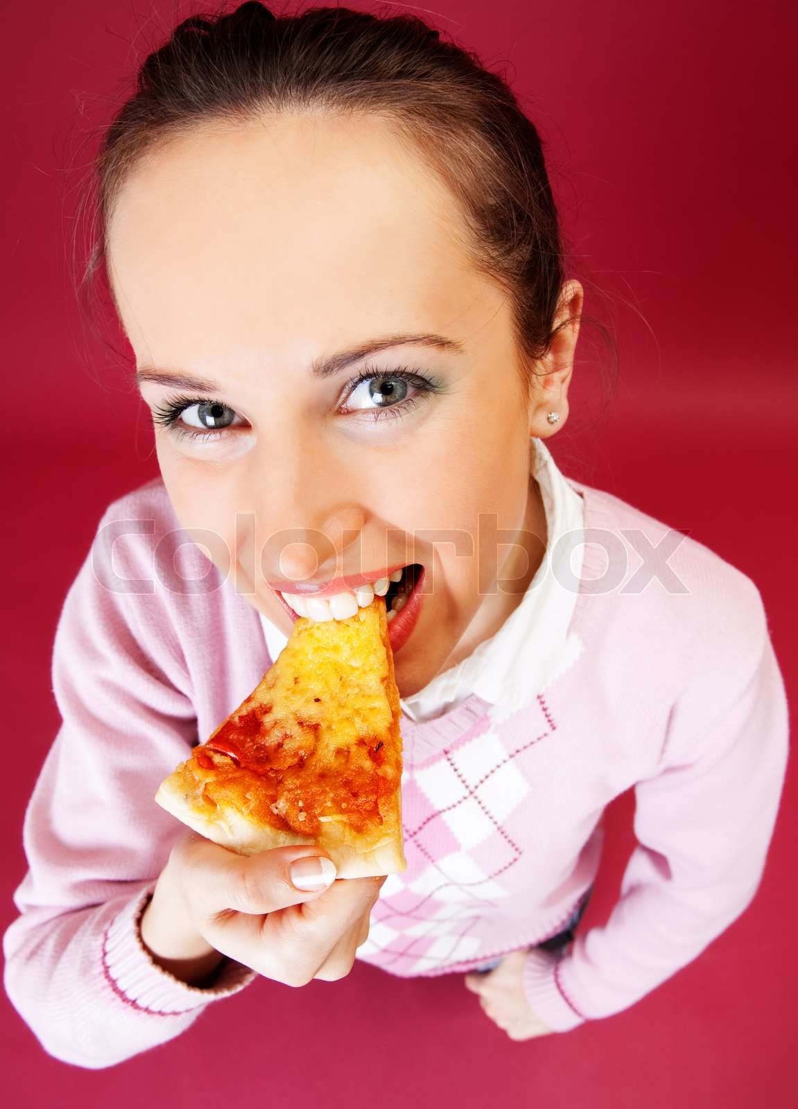 Frau appetitlich Pizza Essen | Stock Bild | Colourbox