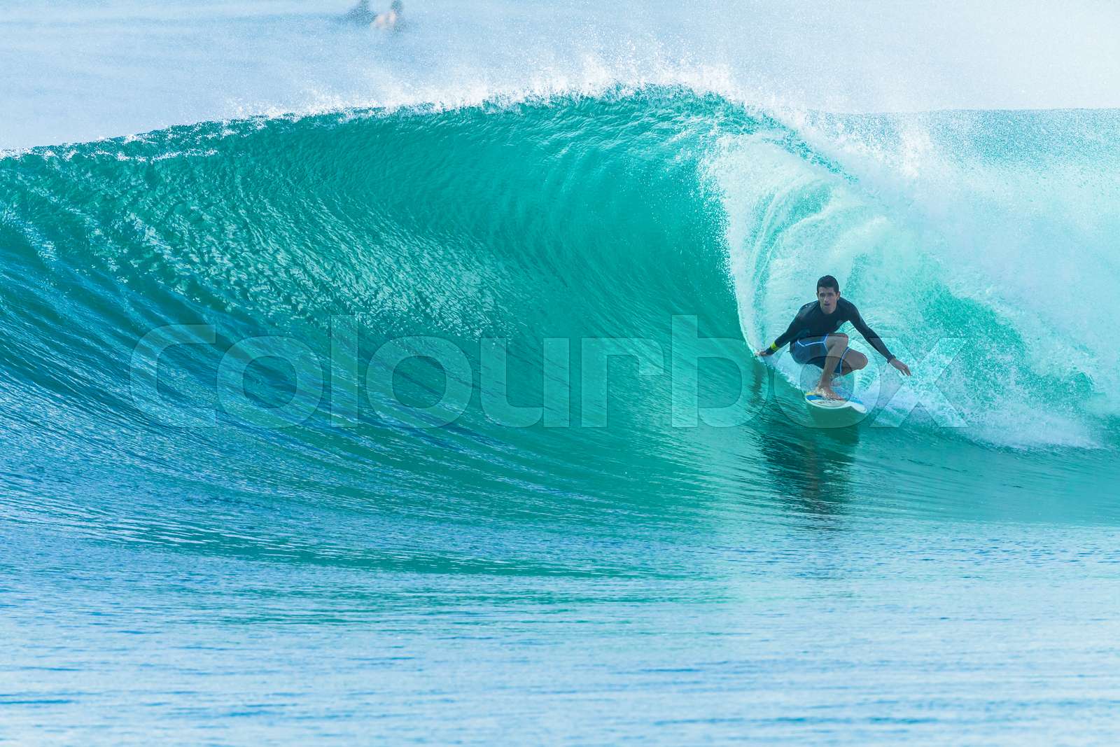 Surfer Riding Hollow Ocean Wave Sequence | Stock image | Colourbox