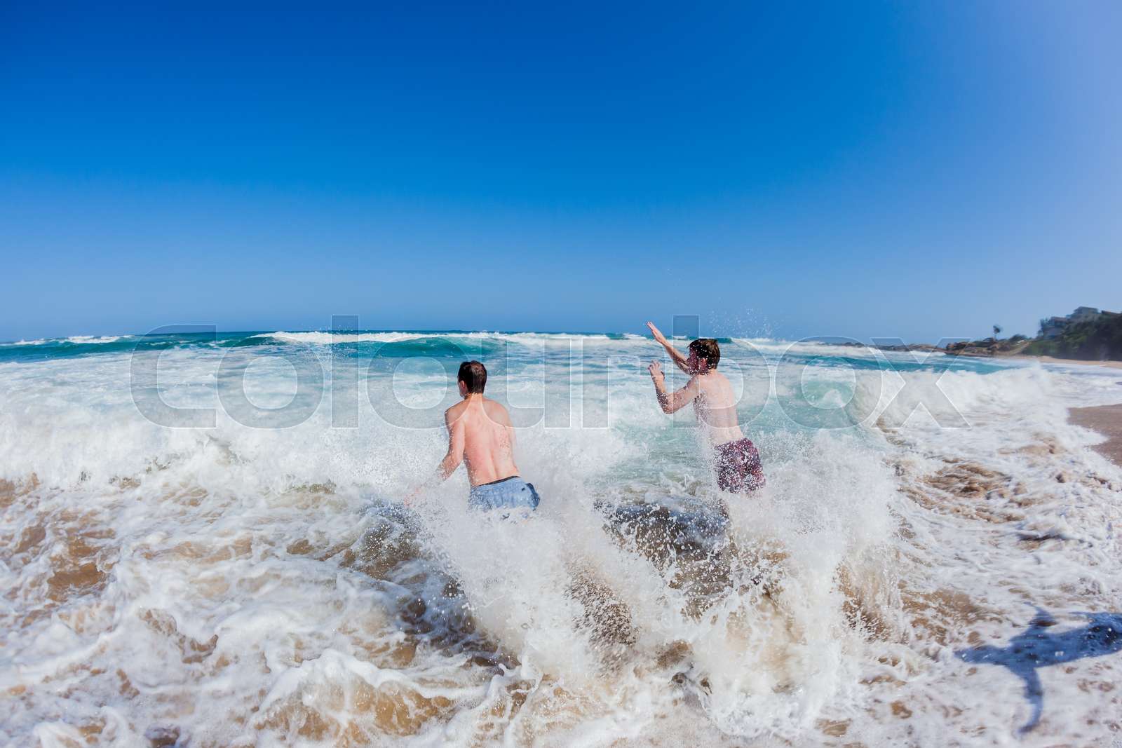 Teenagers Ocean Shorebreak Swim | Stock image | Colourbox