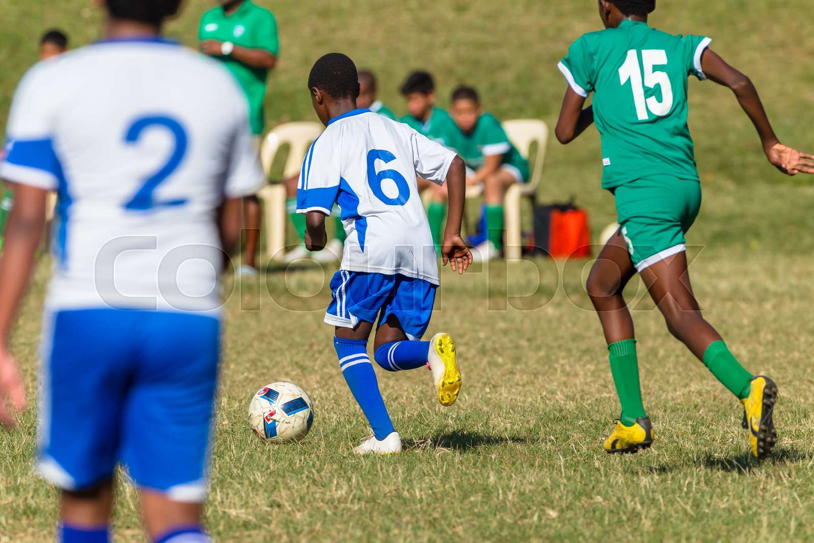 Football Soccer Junior Players Ball Action | Stock image | Colourbox