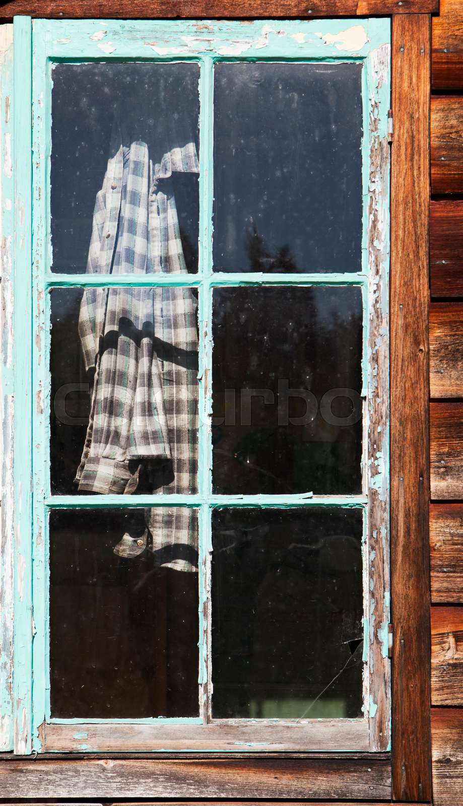 Plaid Shirt In Window | Stock image | Colourbox