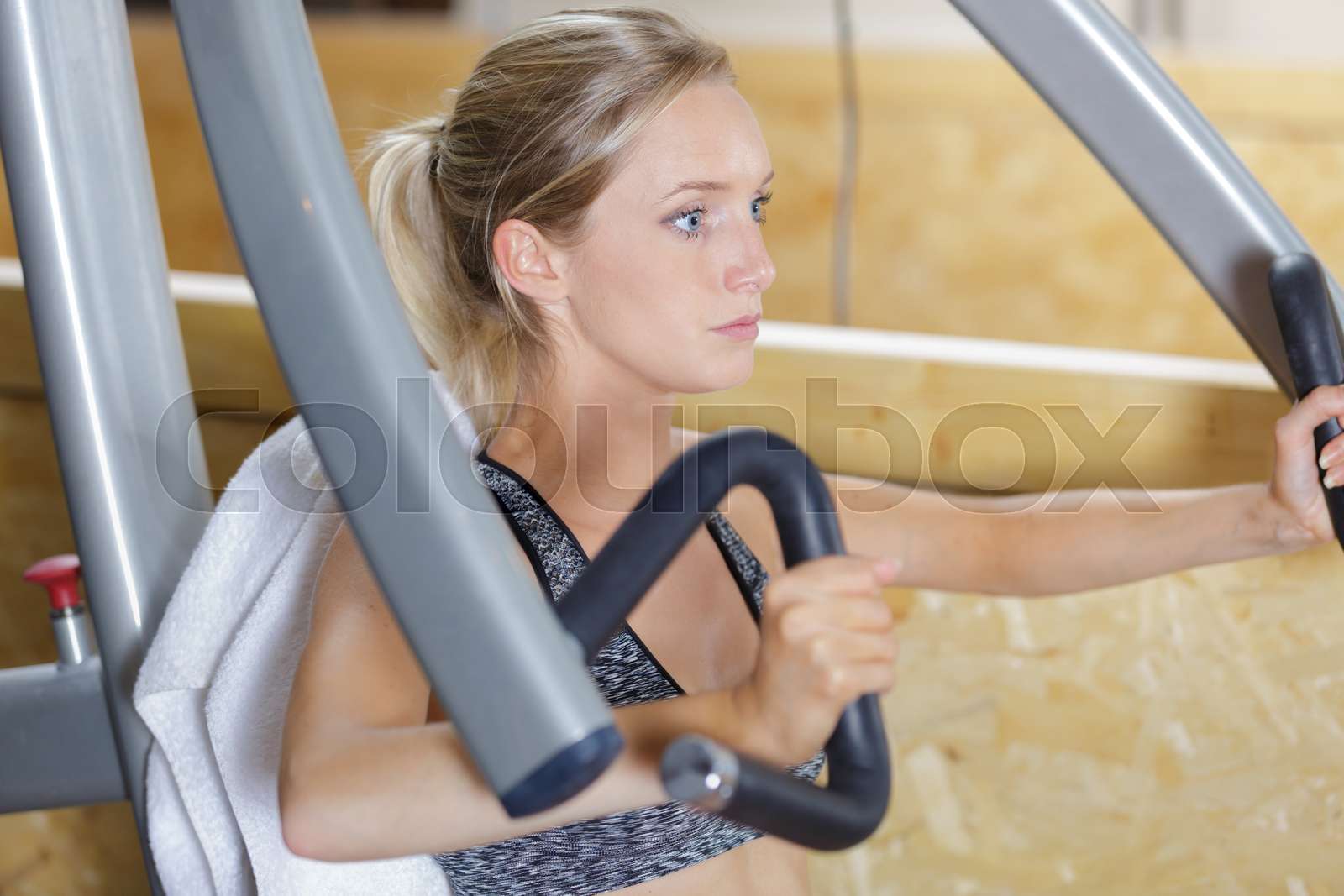 woman trains pectoral muscles | Stock image | Colourbox
