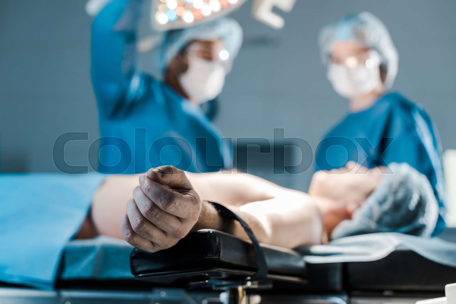 selective focus of patient, doctor and nurse in uniforms and medical ...