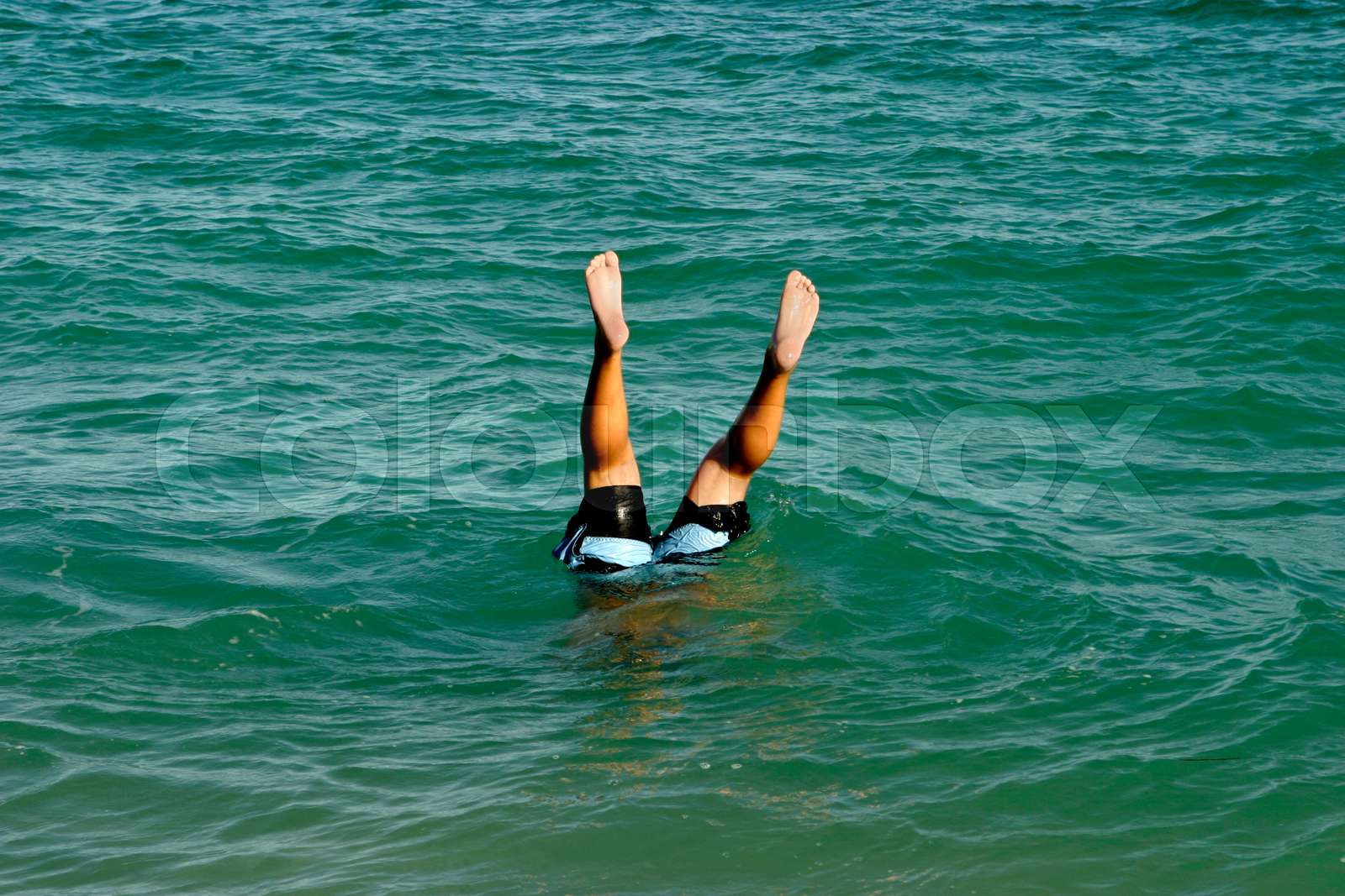 Boy Making A Water Handstand | Stock image | Colourbox