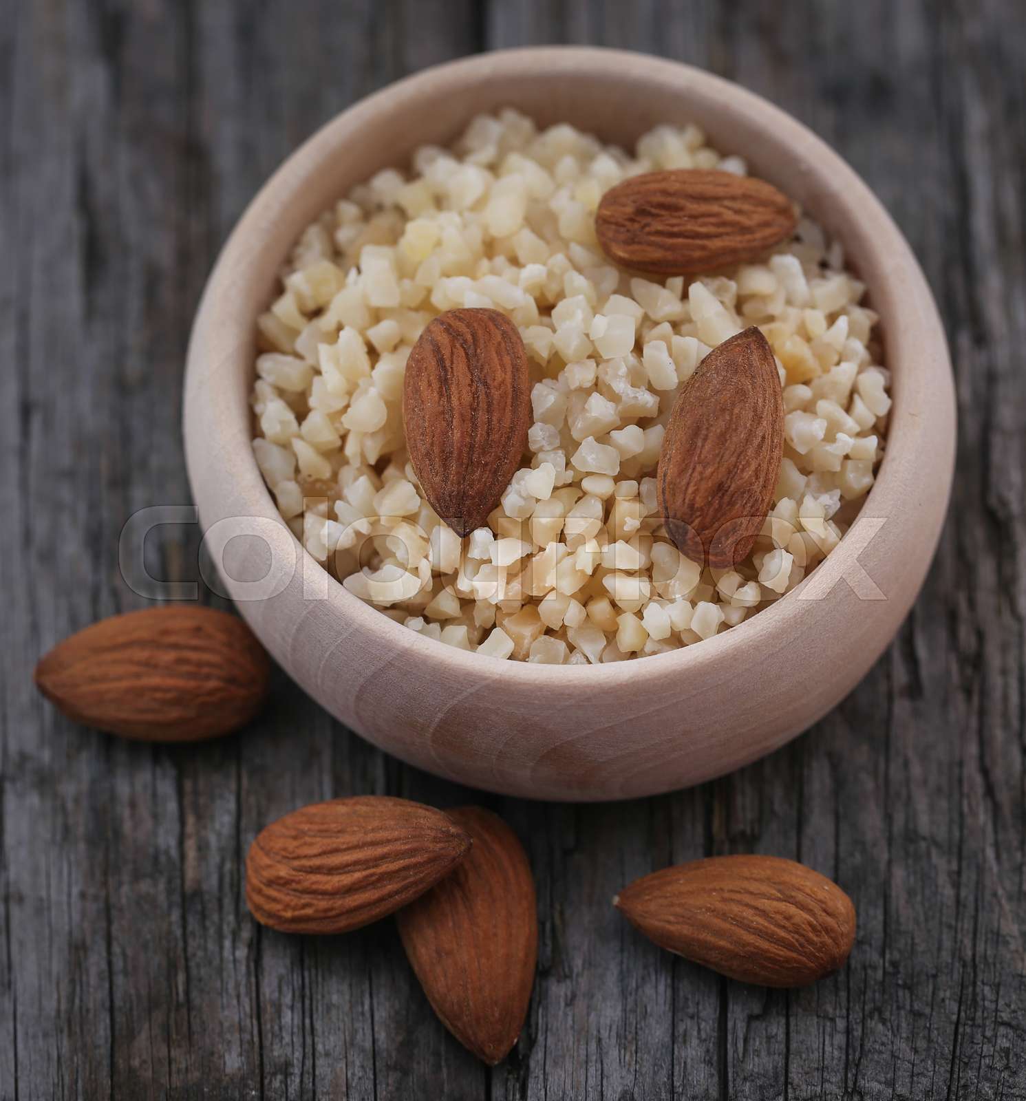 Small pieces of chopped almonds with whole ones | Stock image | Colourbox