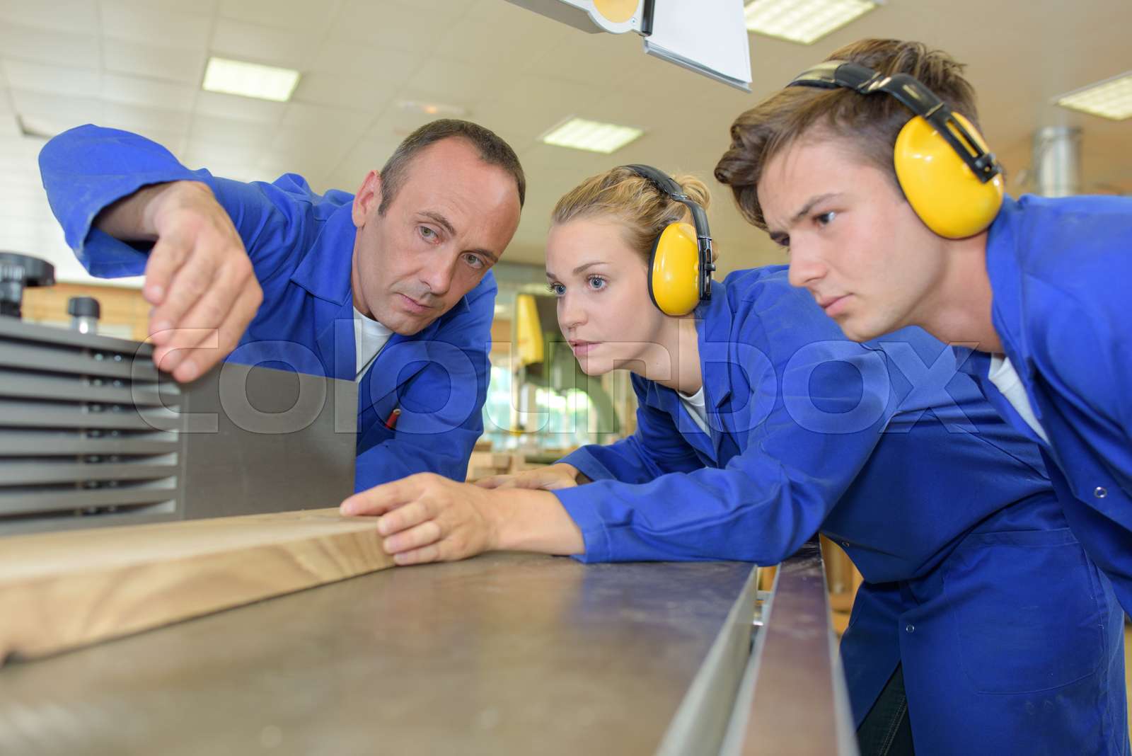 Female apprentice at work | Stock image | Colourbox