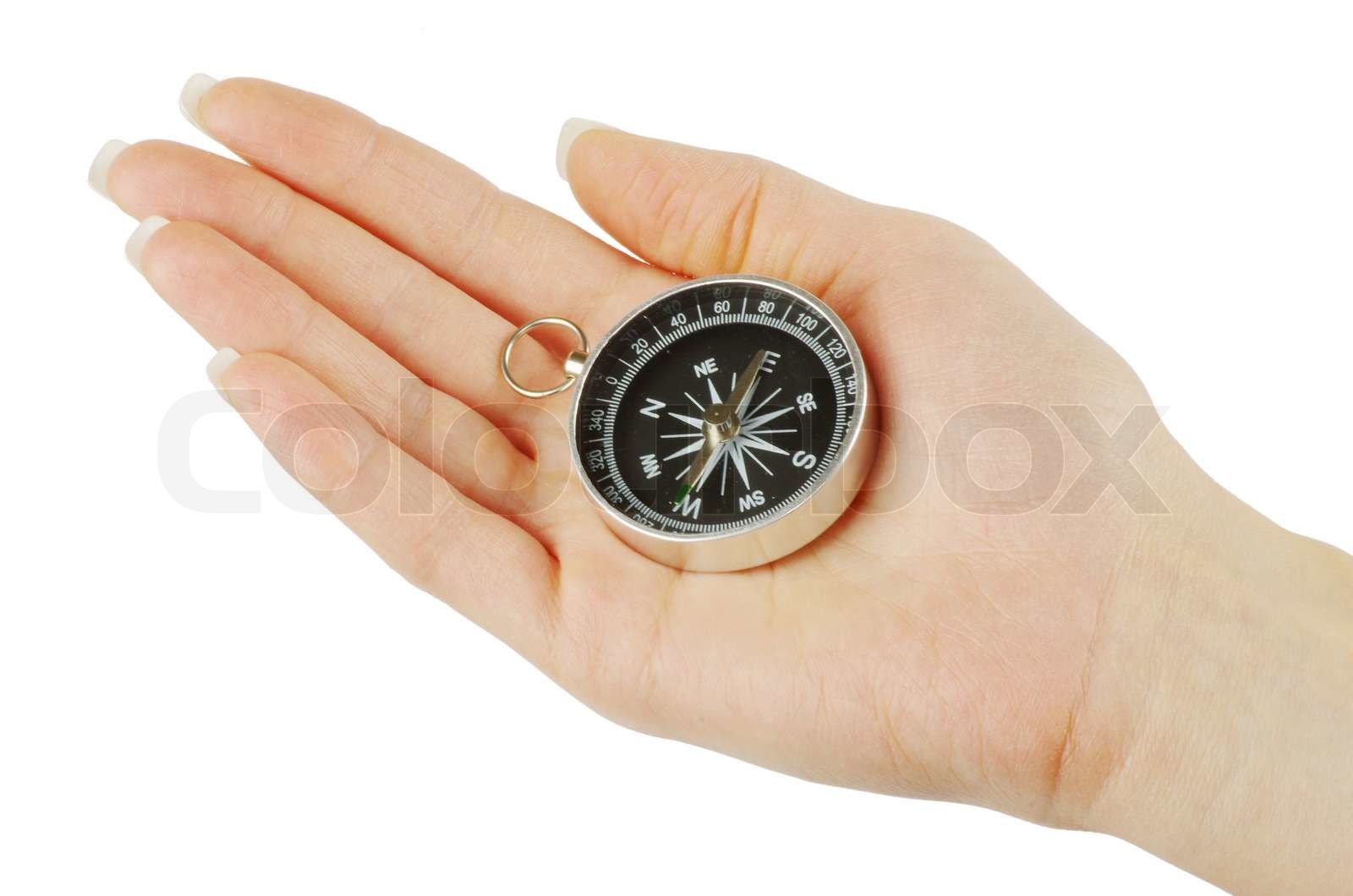 Compass in hand | Stock image | Colourbox