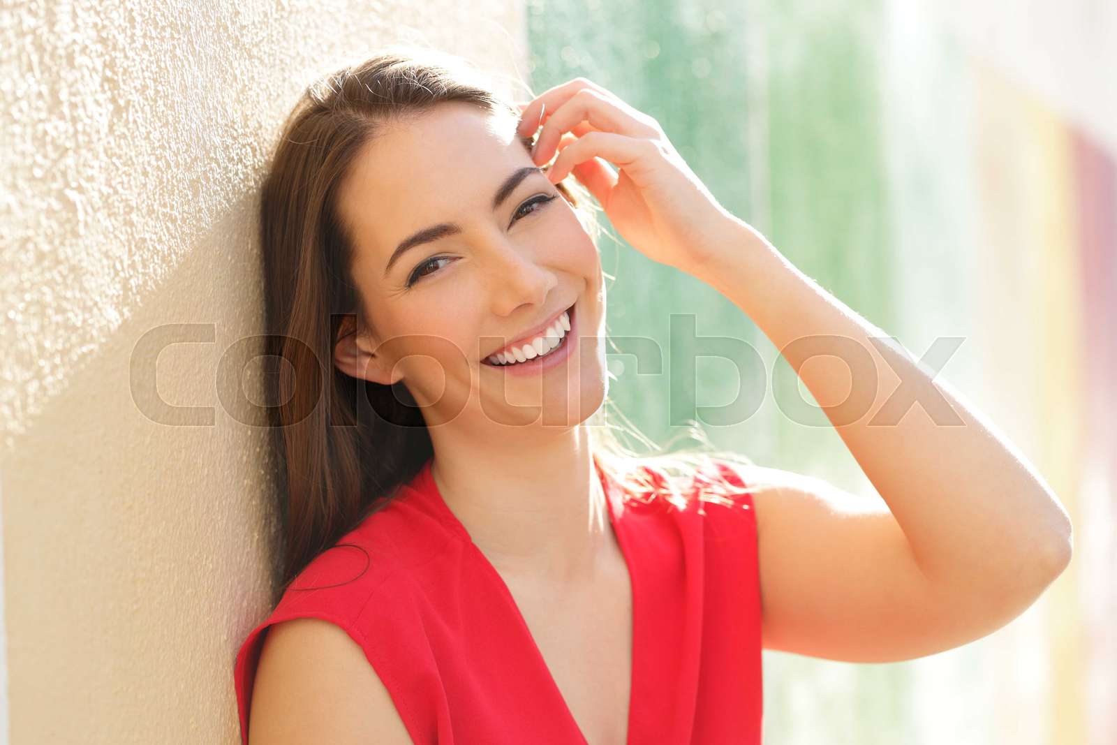 Candid woman in red with perfect smile looking at camera | Stock image ...