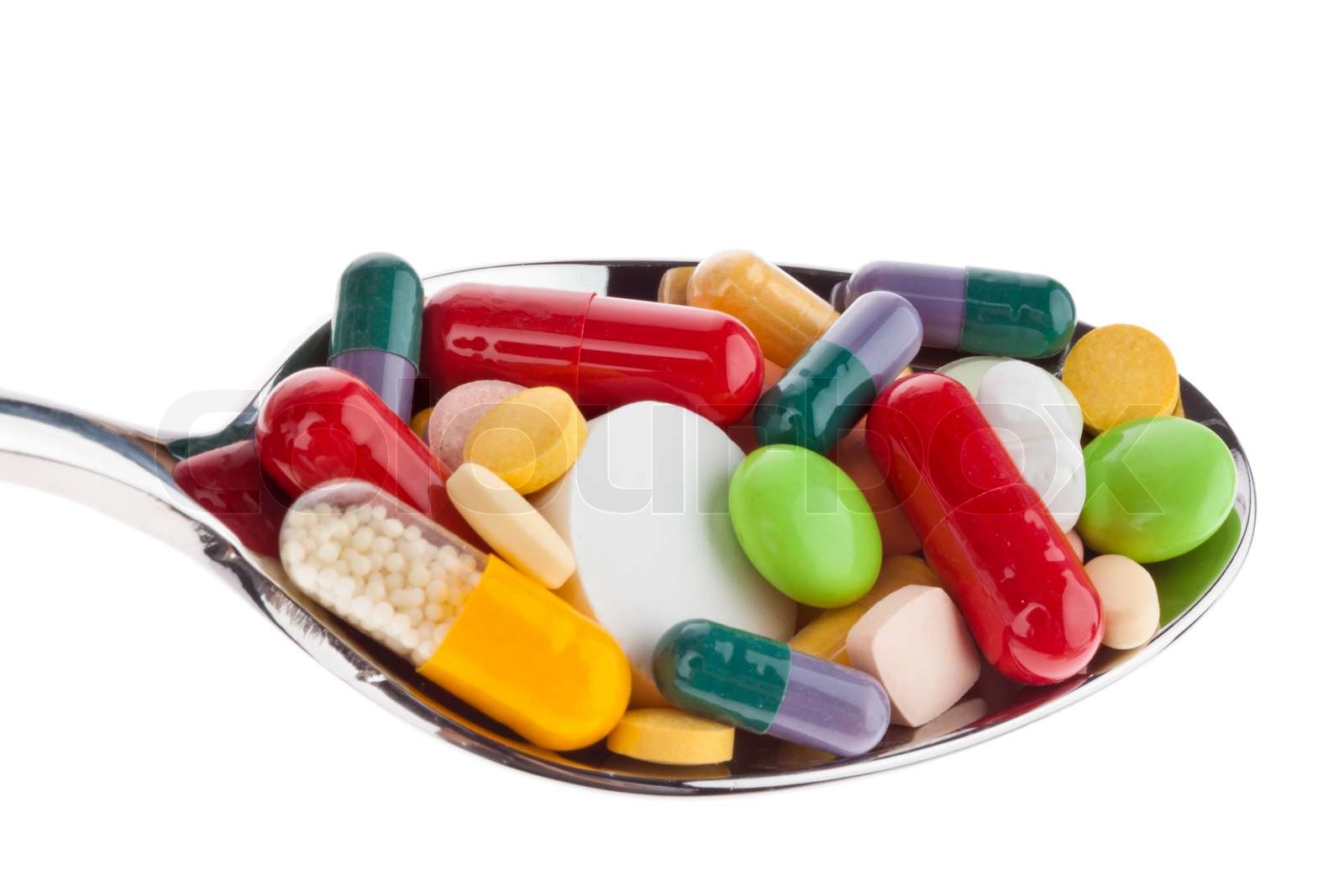 Tabletten und Medikamente auf Löffel | Stock Bild | Colourbox