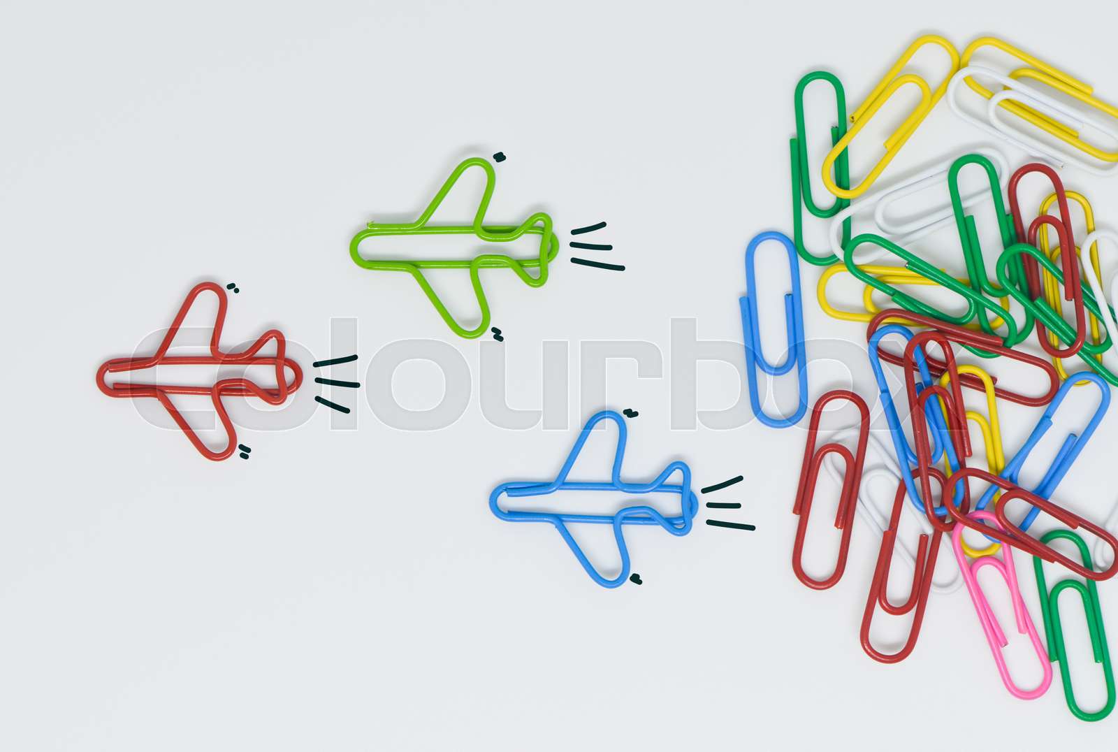 Business concept for group of stacked paperclip with group of plane ...