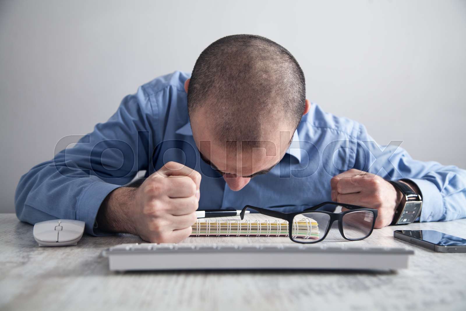 Businessman hits the table with his fists. Concept of anger | Stock ...