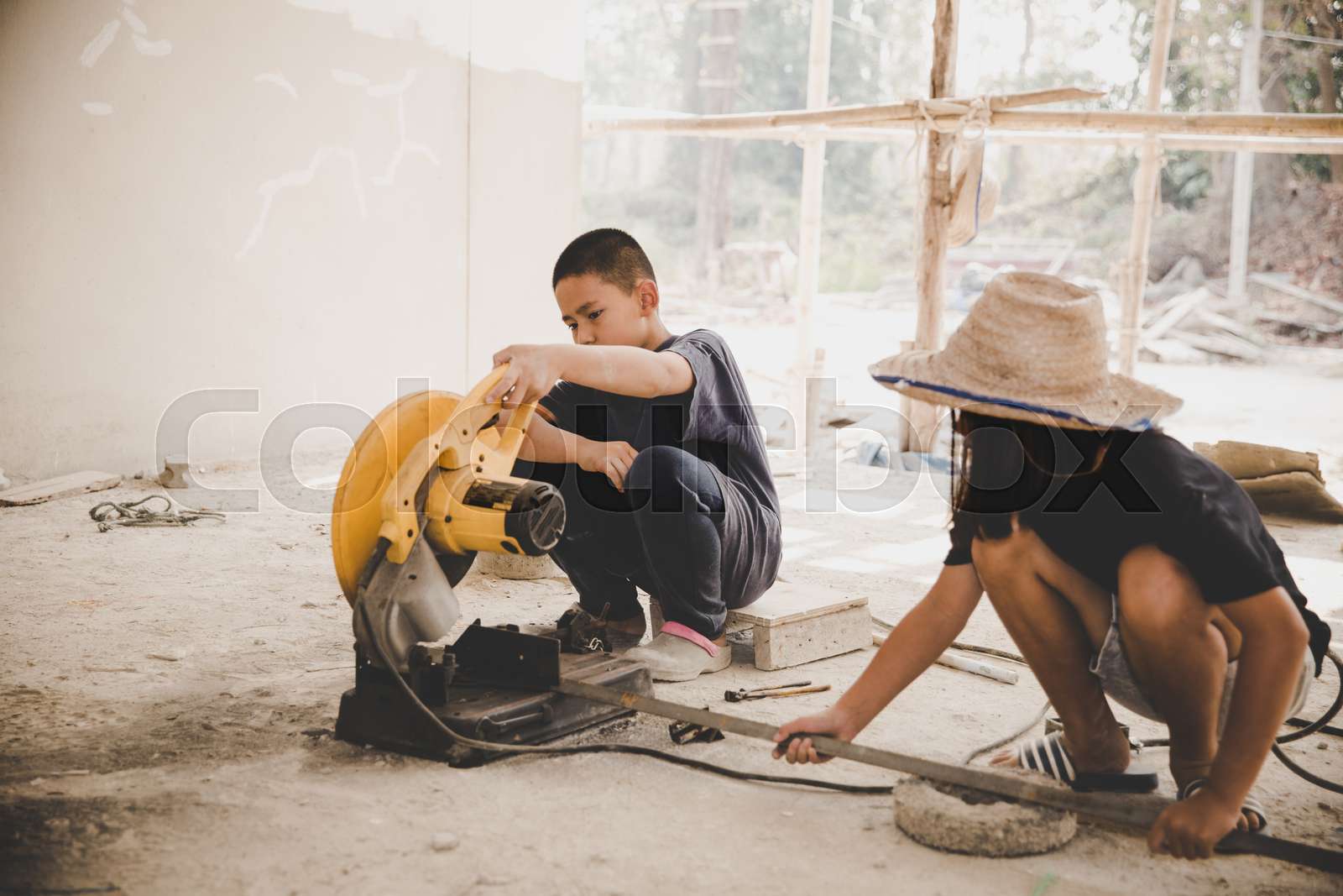 Little boys and girls labor working in commercial building structure, World Day Against Child ...