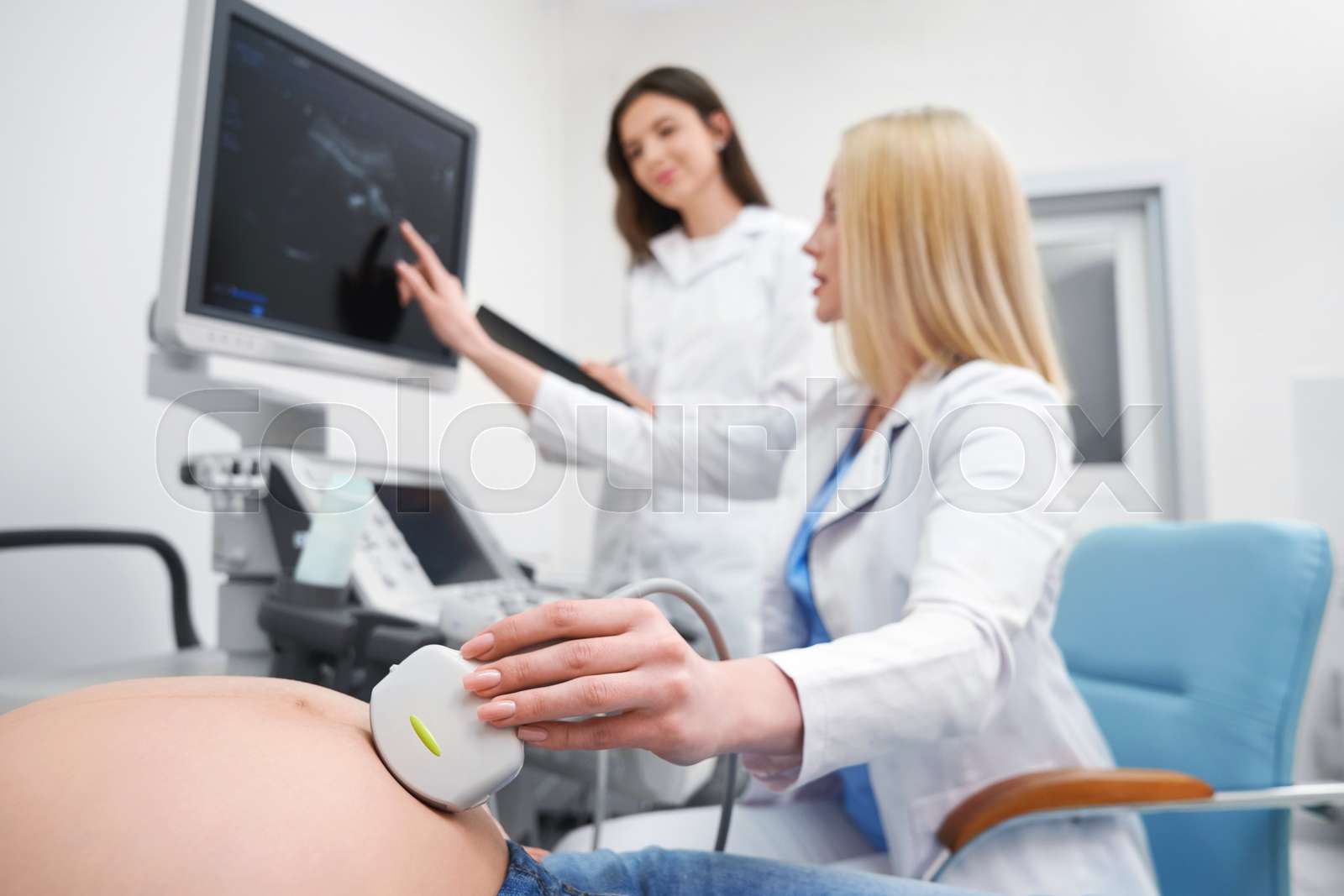 Process of doing ultrasound diagnostic in medical center | Stock image ...