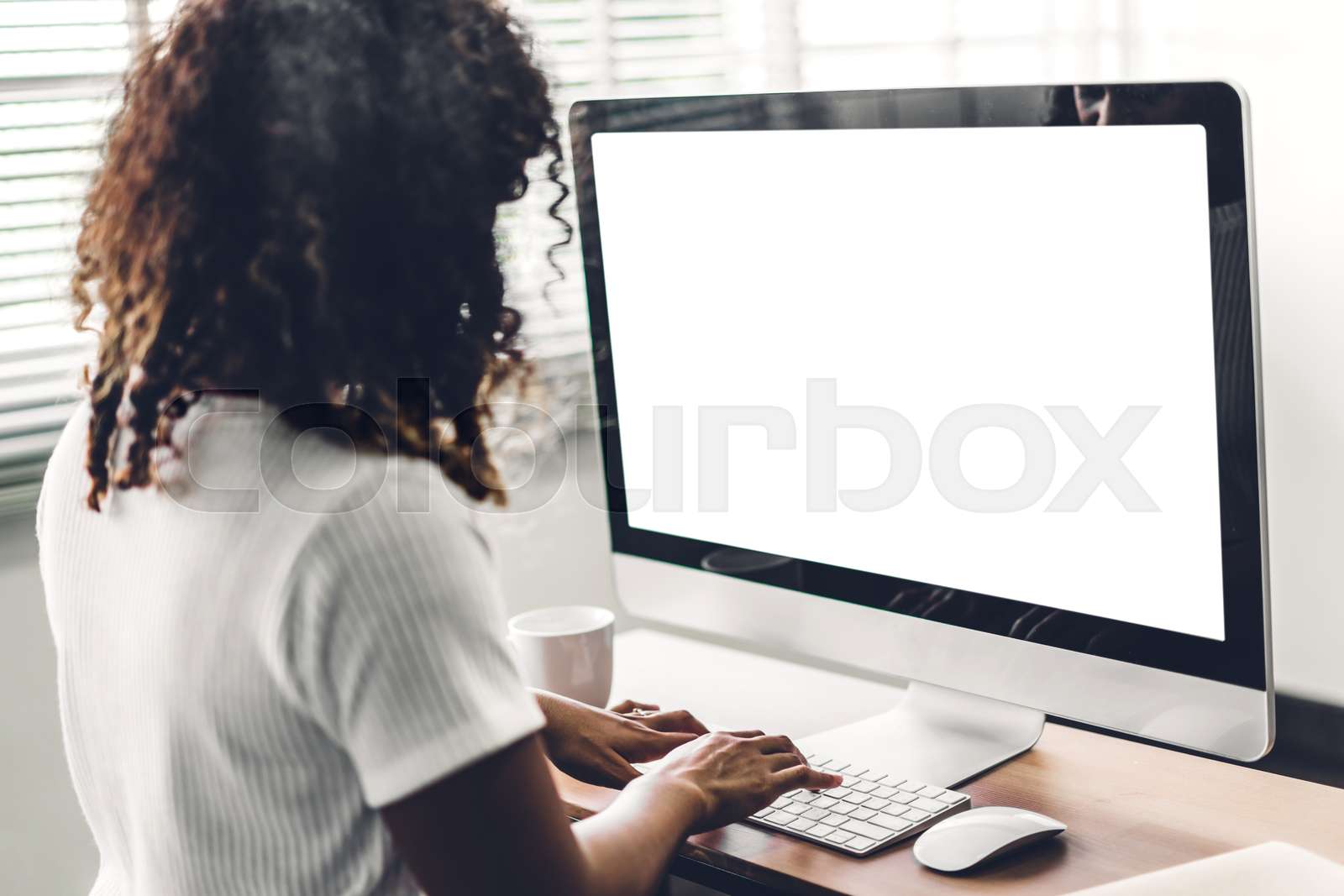 African american black woman using computer with white mockup blank ...