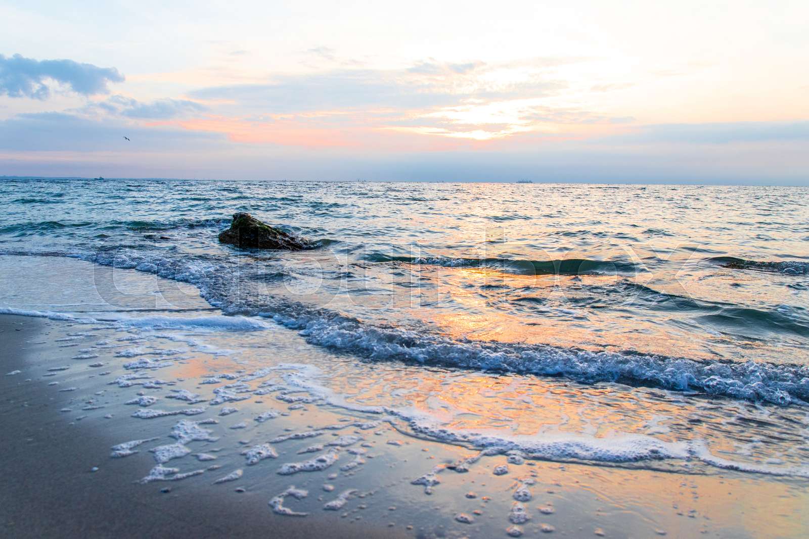 Radiant sea beach sunset | Stock image | Colourbox
