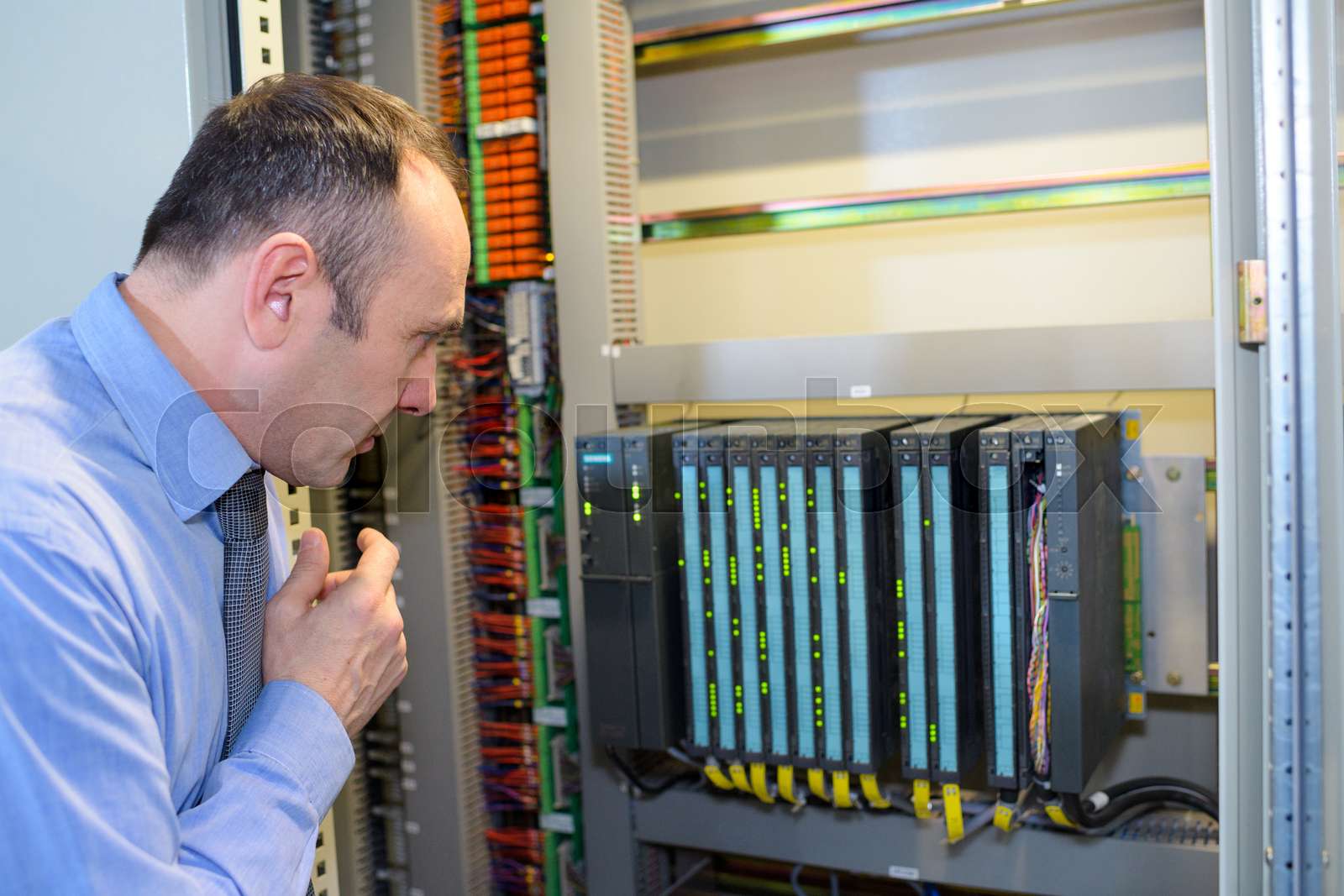 network engineer admin at data center | Stock image | Colourbox