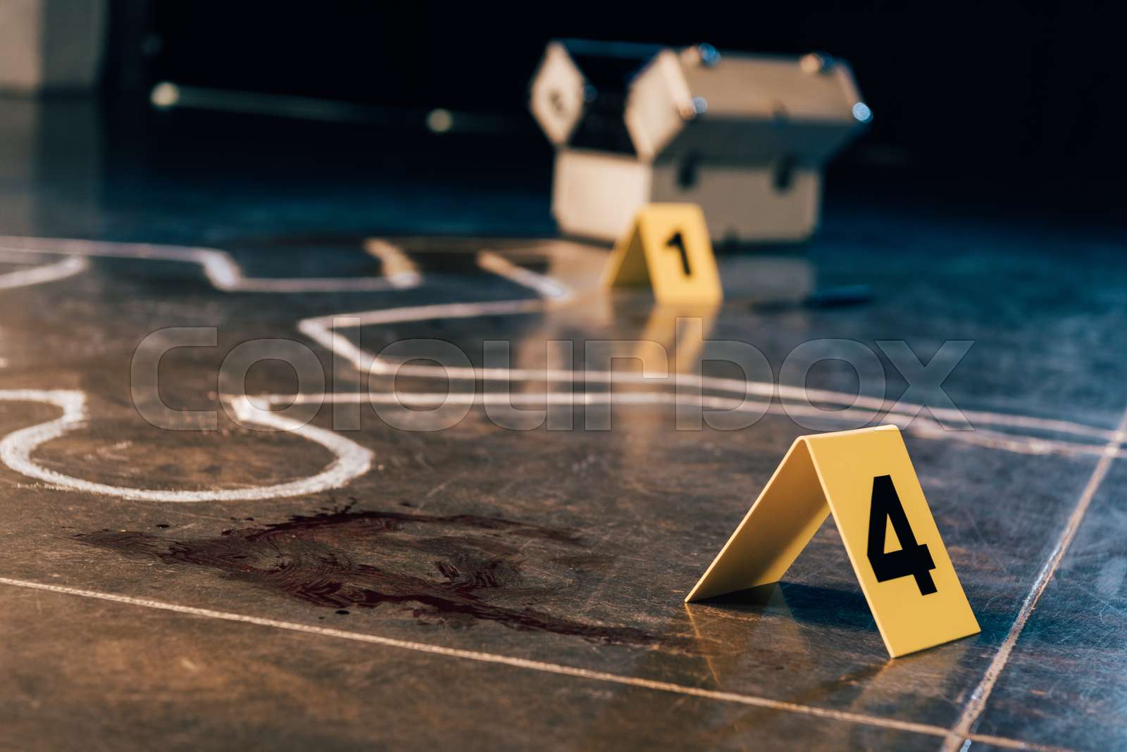 chalk outline, blood stain, investigation kit and evidence markers at ...