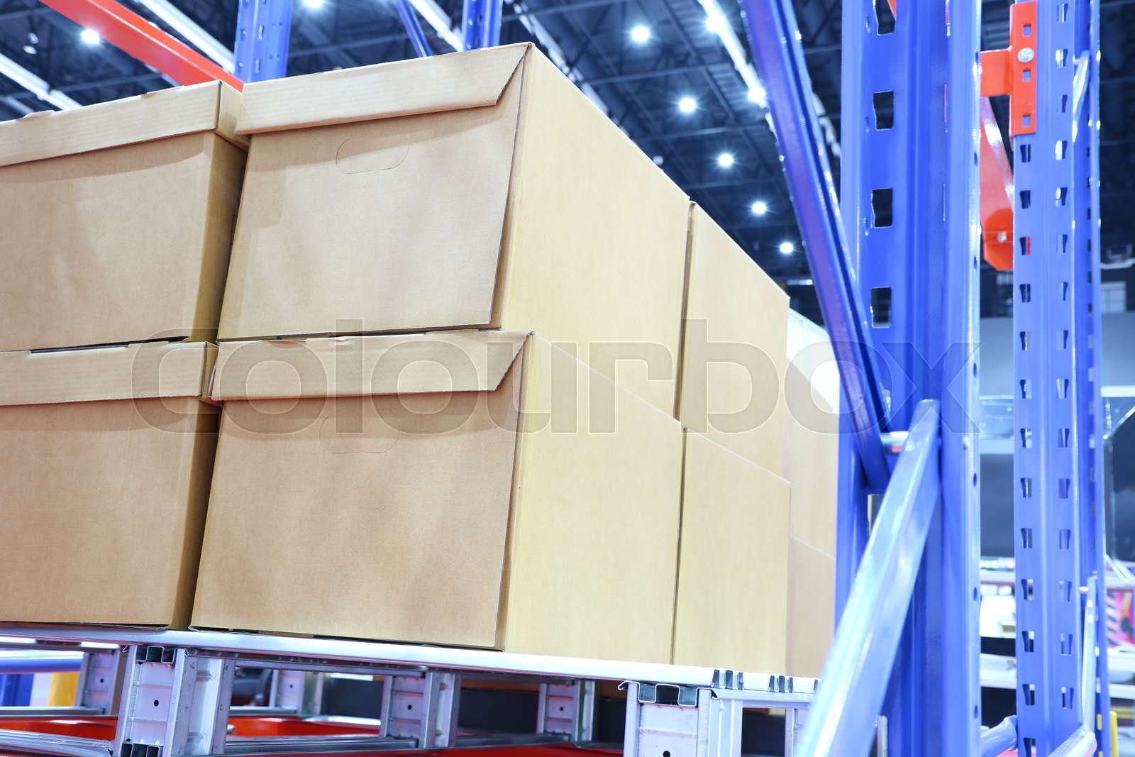 row of cotton boxes kept in warehouse shelves ; | Stock image | Colourbox