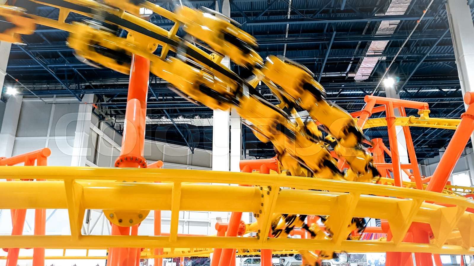 Image of roller coaster carts and track in amusement park at shopping ...