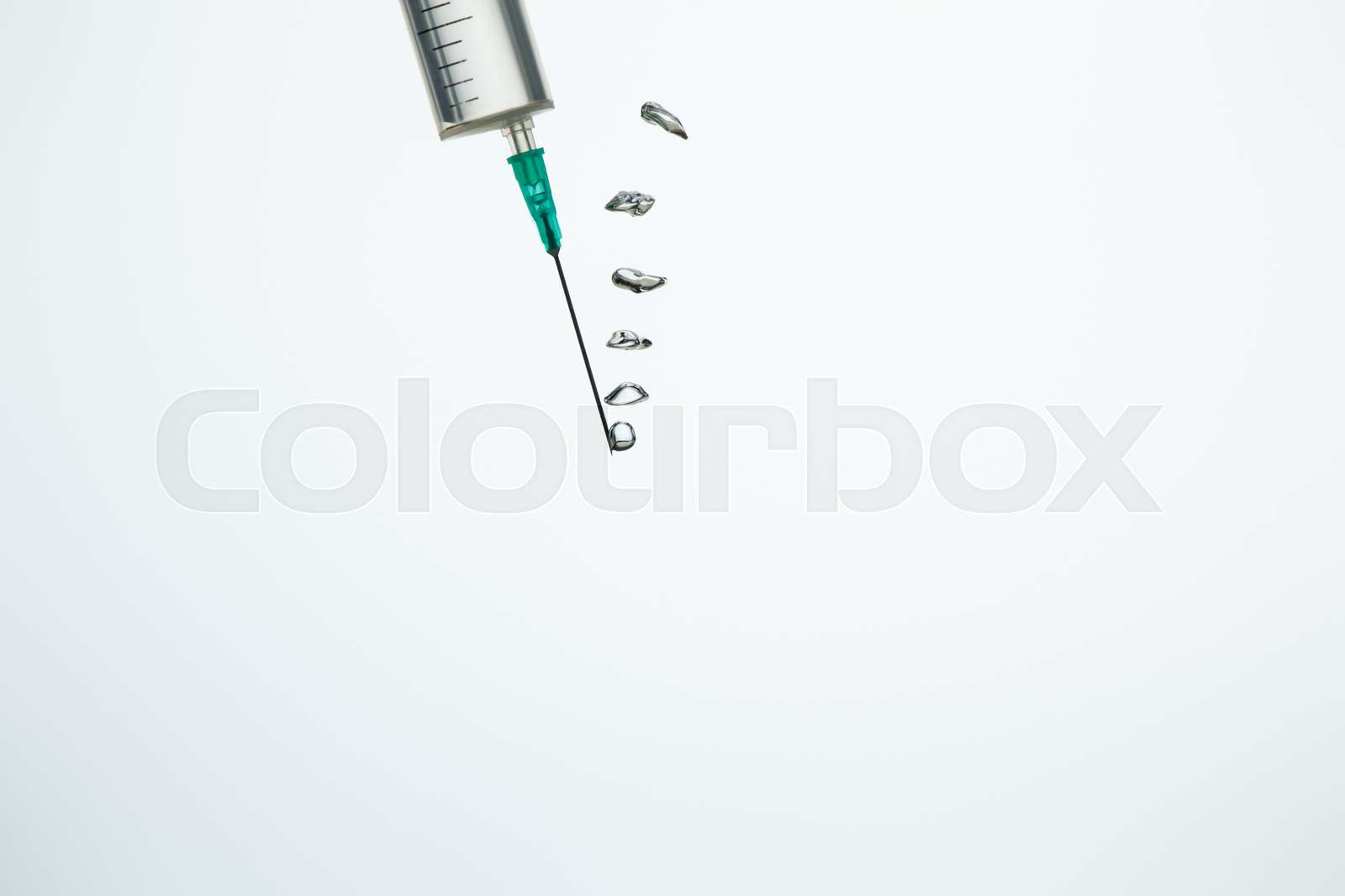 Close up of syringe with bubbles in water isolated on white | Stock ...
