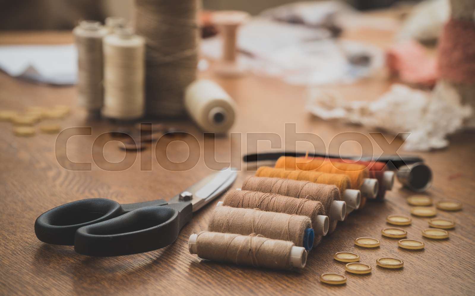 Sewing concept. Scissors, threads and buttons. | Stock image | Colourbox
