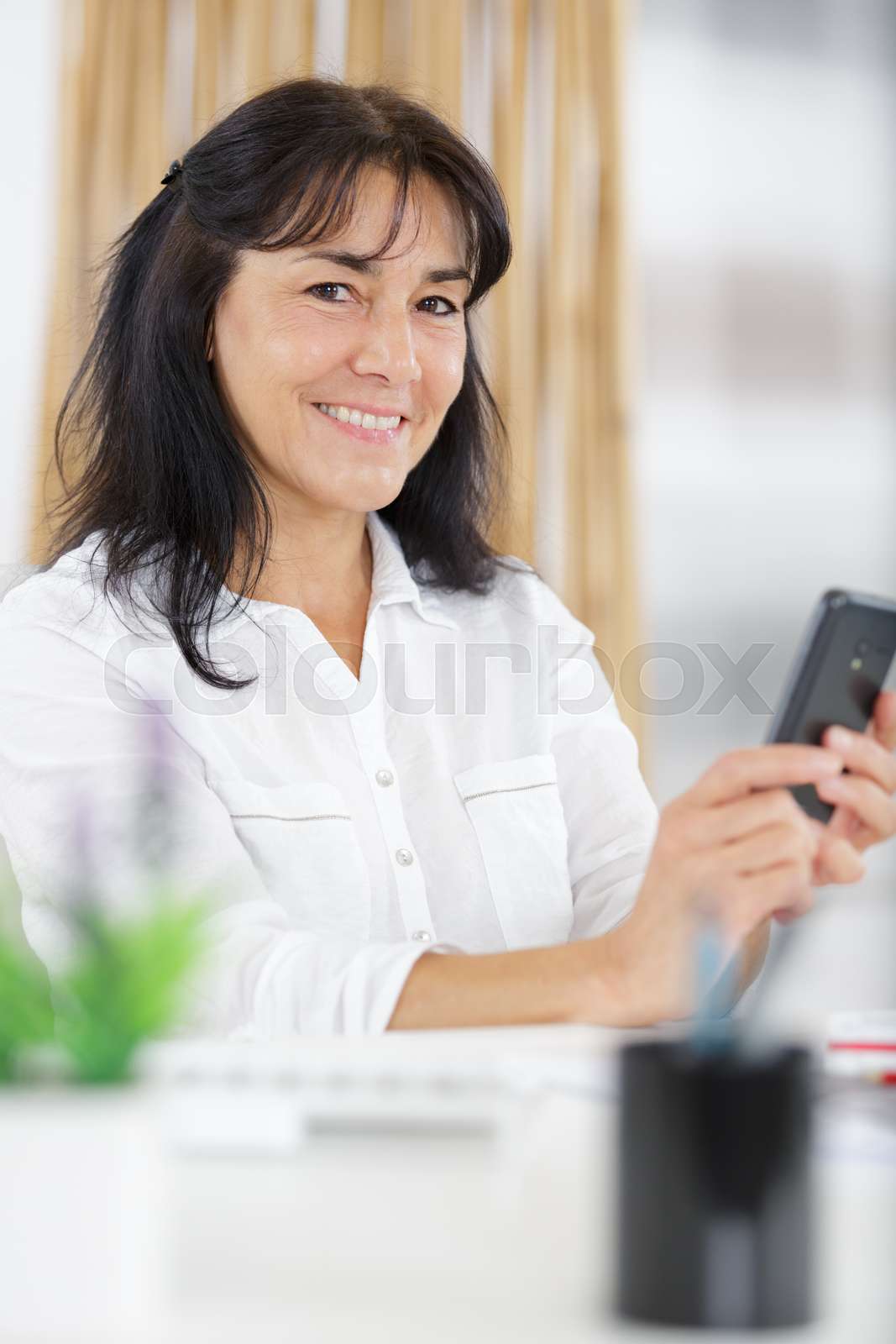 Woman Calculating With A Calculator Stock Image Colourbox woman-calculating-with-a-calculator-stock-image-colourbox