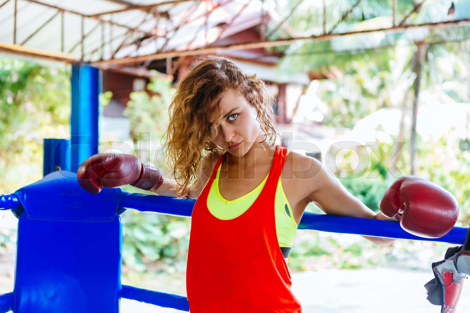 female boxer inside thai boxing ring. angree emotions. | Stock image ...
