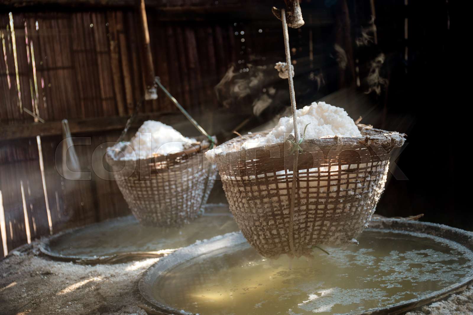 Ancient method of boiling brine into pure salt. | Stock image | Colourbox