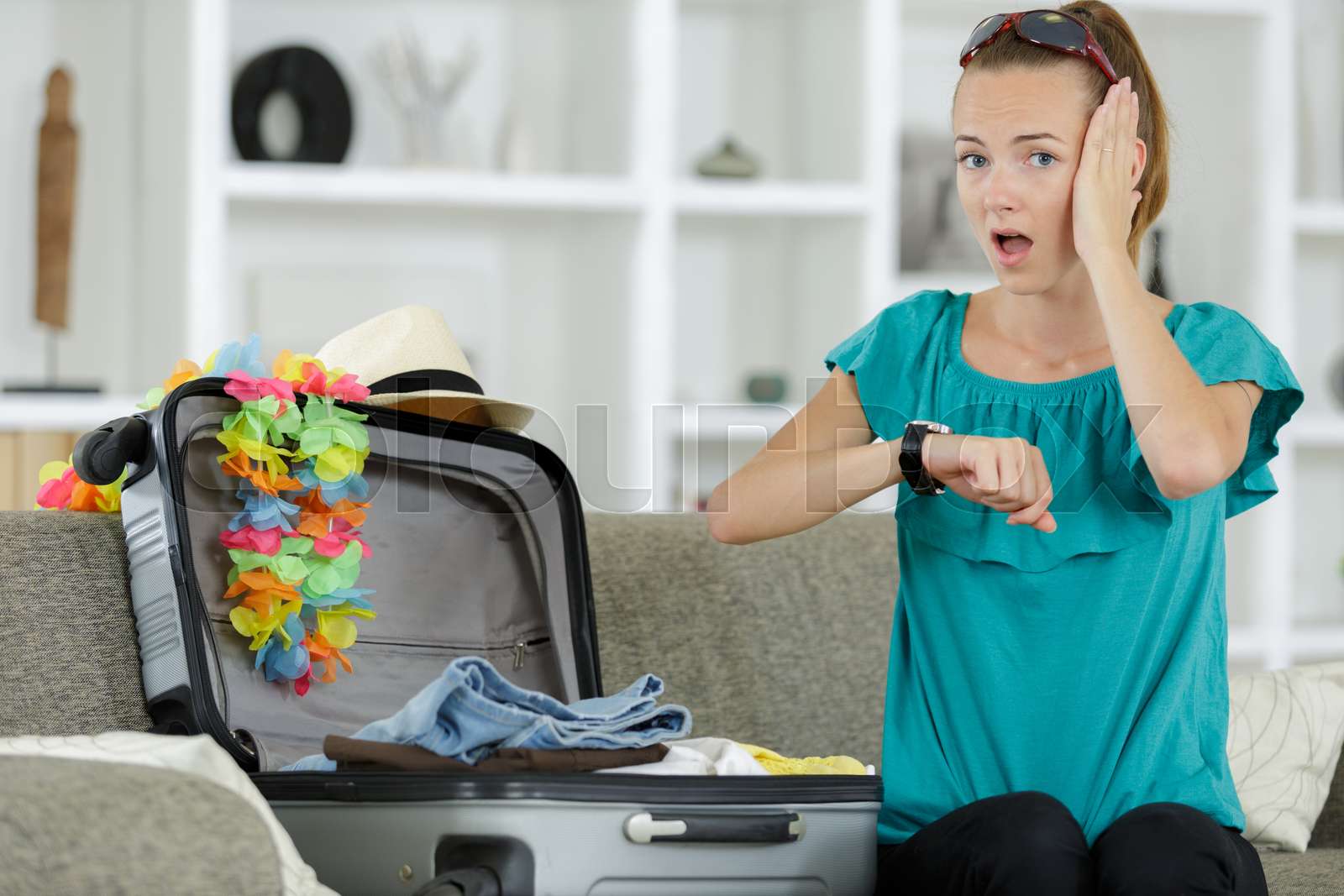 young woman late for flight | Stock image | Colourbox