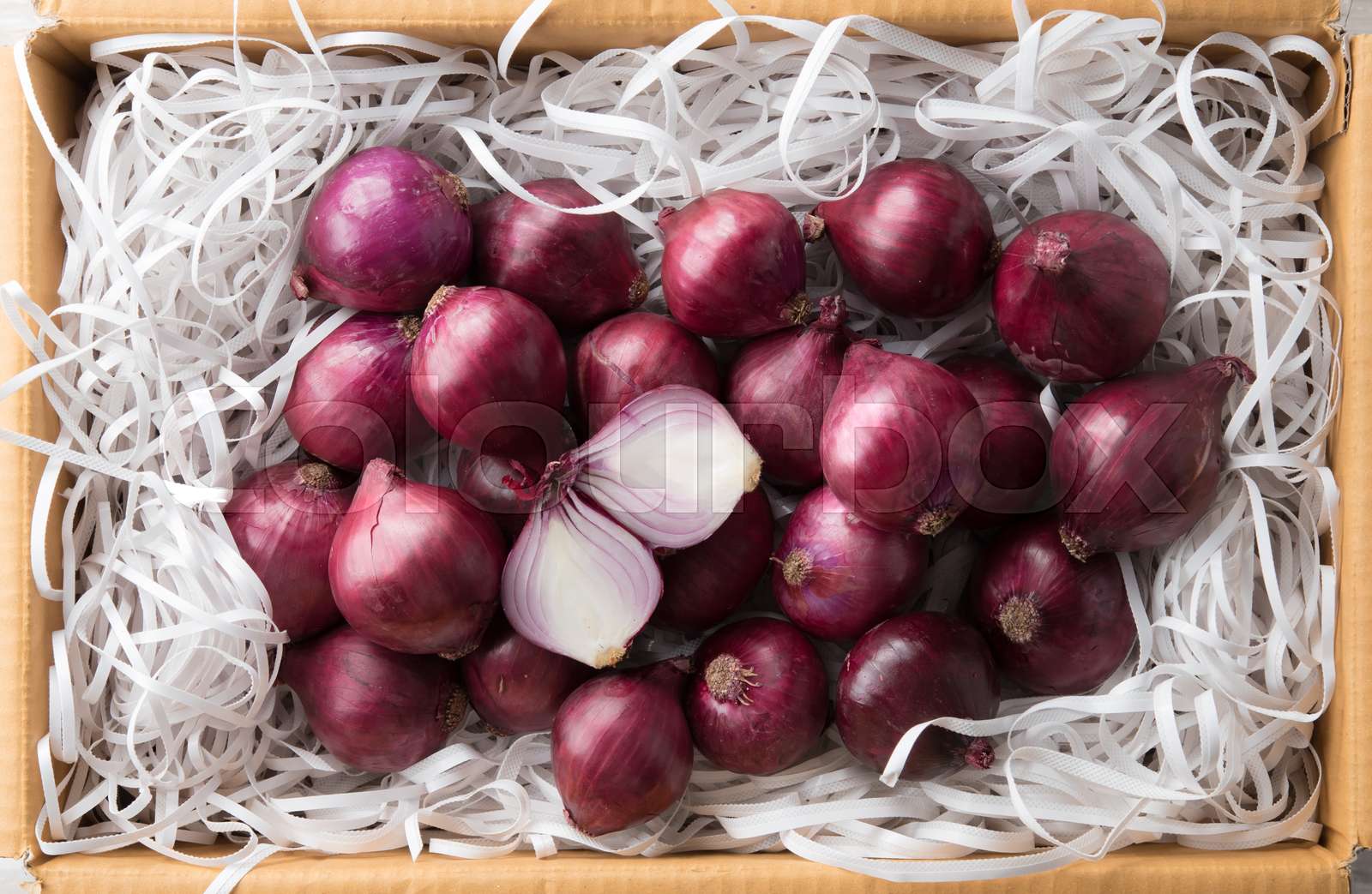 Fresh whole purple onions in the box for packing product | Stock image ...