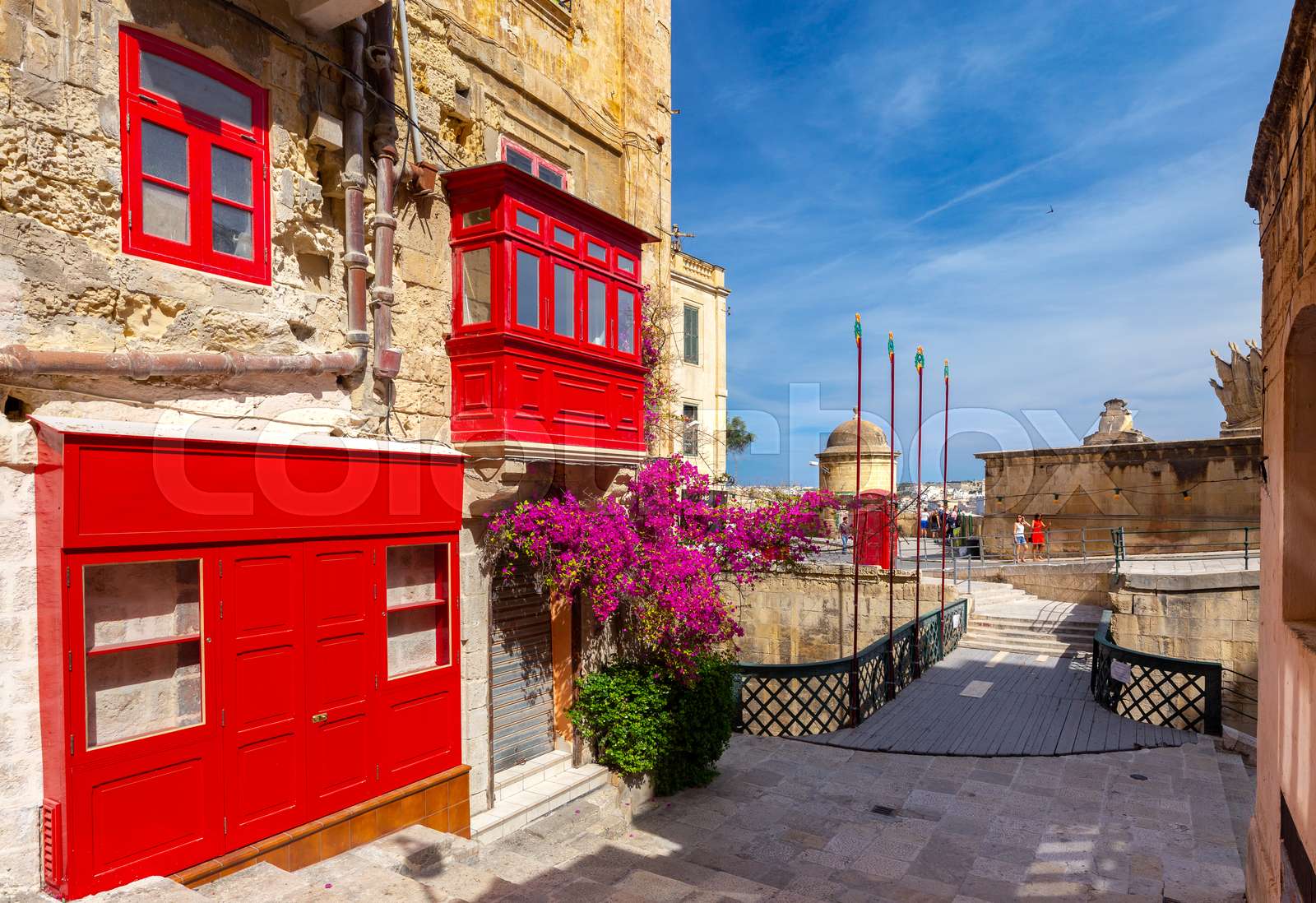 Malta. Multi-colored traditional balconies on the facades of old houses ...
