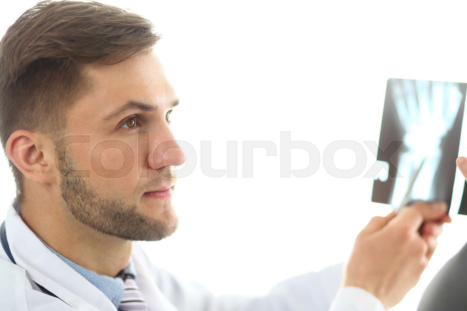 Doctor explaining something to patient | Stock image | Colourbox