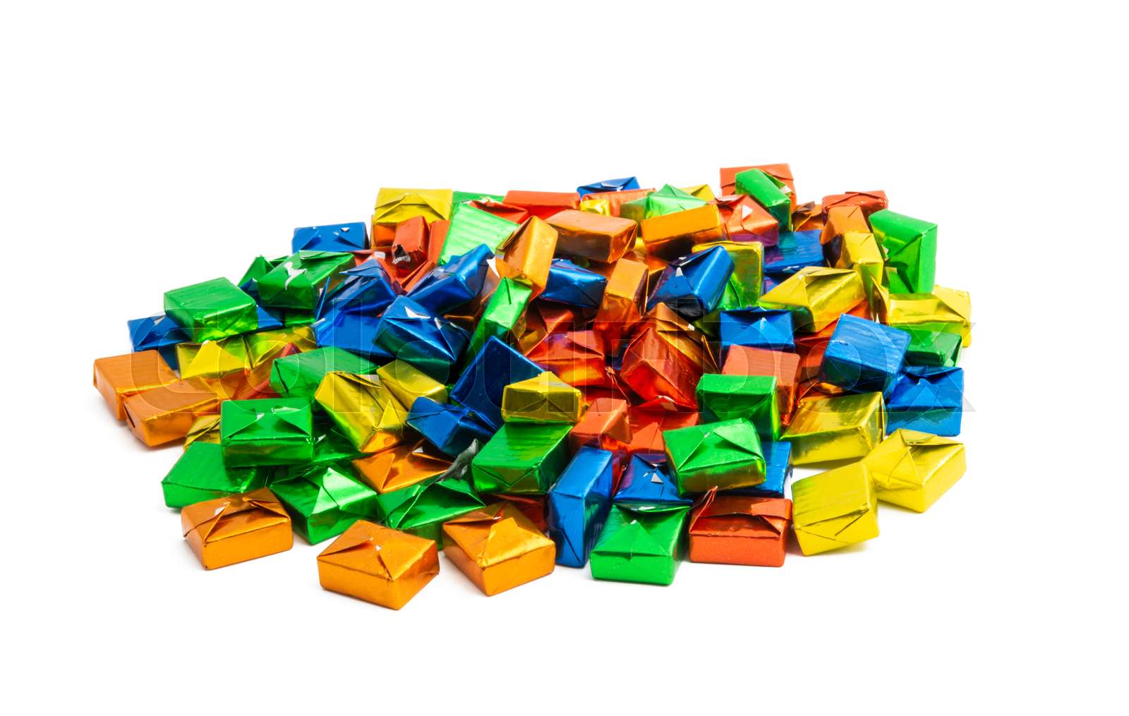 candy in a multi-colored wrapper isolated | Stock image | Colourbox