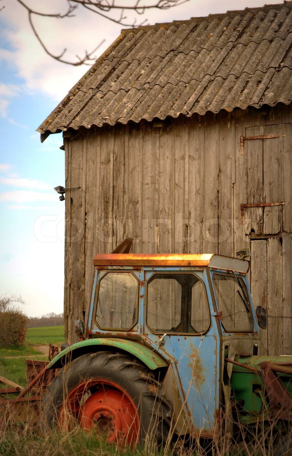 Vintage Farming Scene With Old Tractor | Stock image | Colourbox