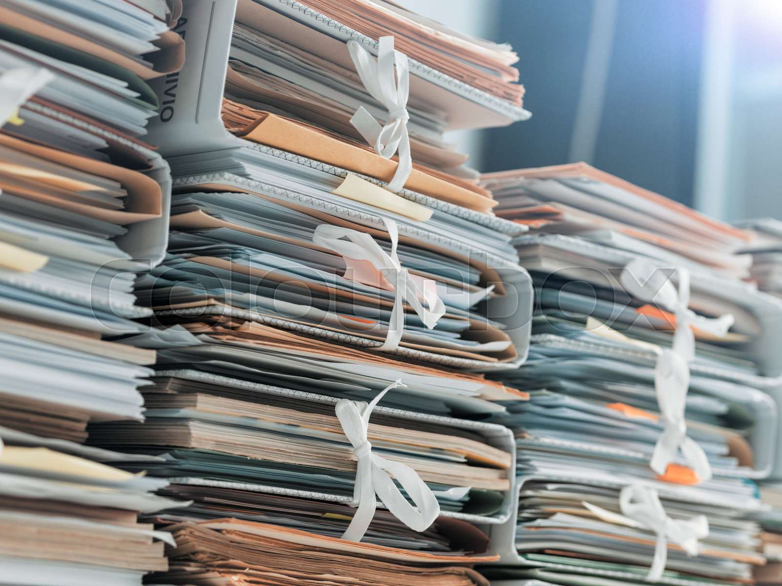 Stacks of paperwork in the office | Stock image | Colourbox