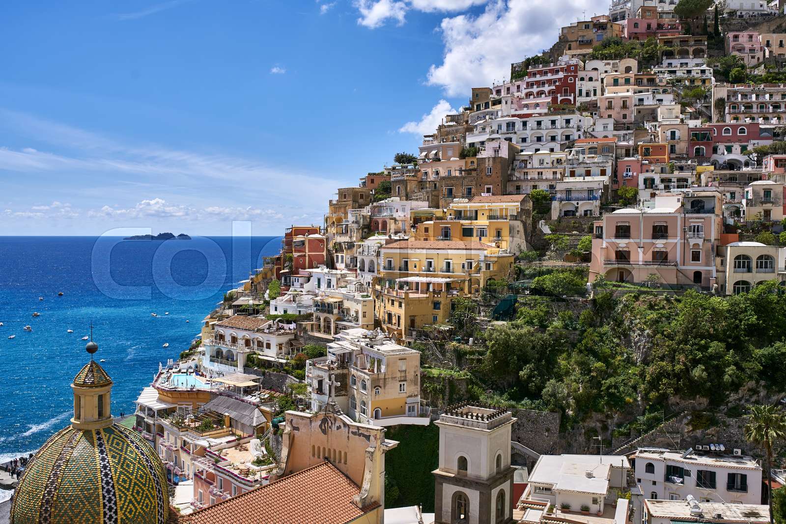 Colorful houses and church on coastline of Positano town in Italy ...